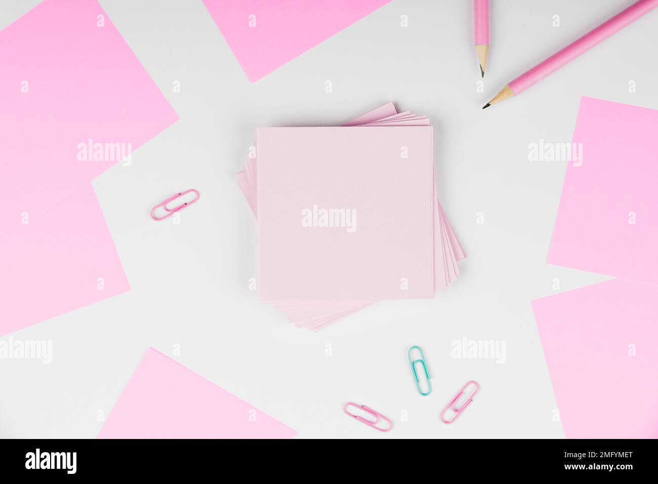 Notebook and Colored Papers Stickers Lying On White Desk. Multiple ...