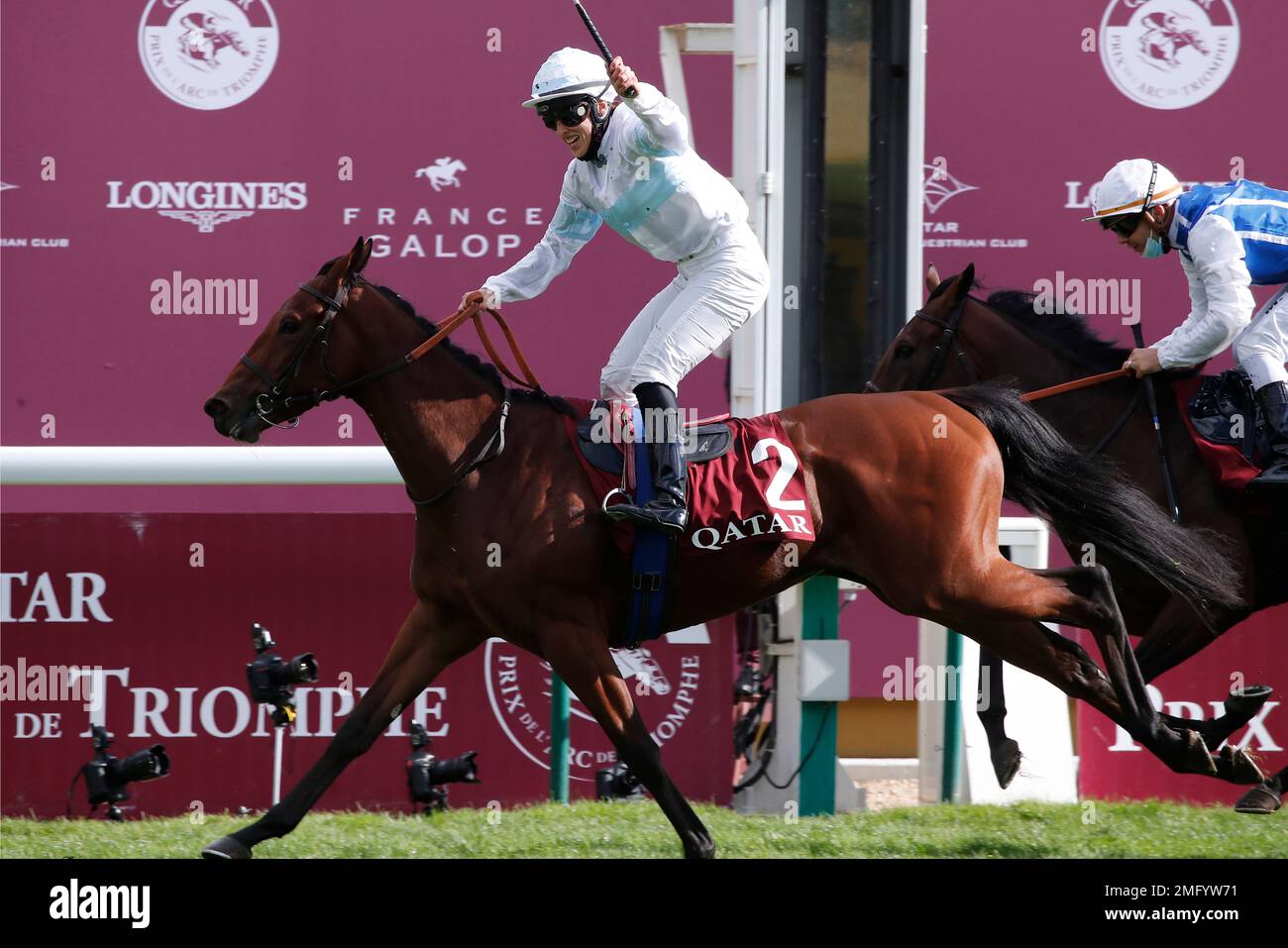 Jockey Jessica Marcialis, of Italy, riding horse Tiger Tanaka wins the ...
