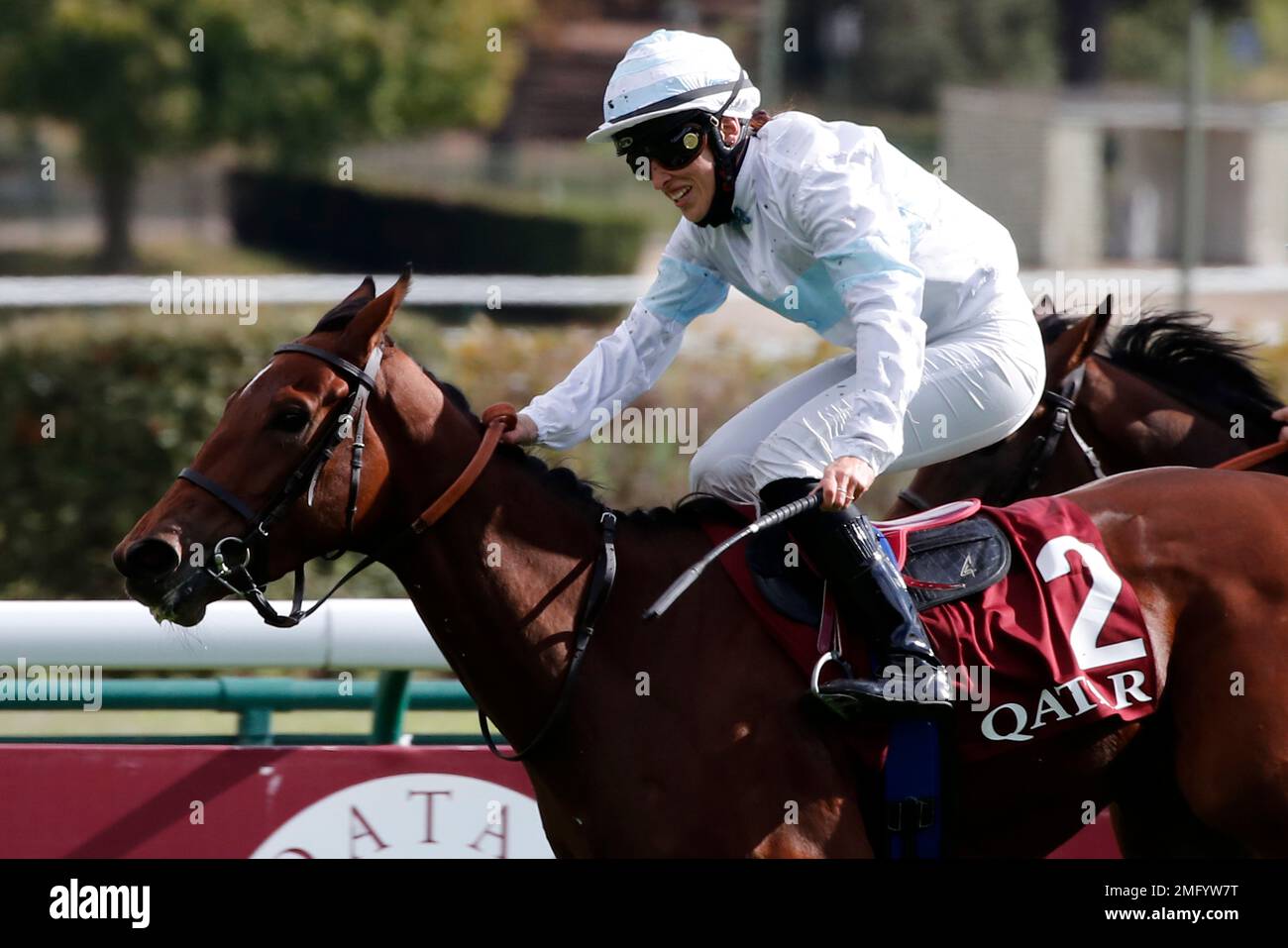 Jockey Jessica Marcialis, of Italy, riding horse Tiger Tanaka smiles ...