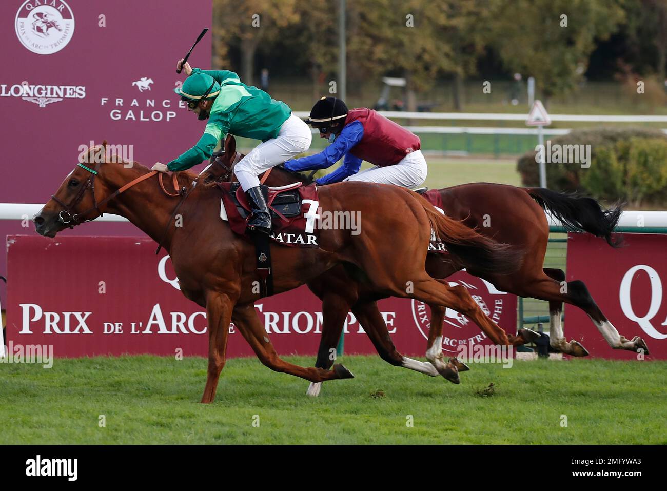 Jockey Cristian Demuro riding Sottsass crosses the finish line to win ...