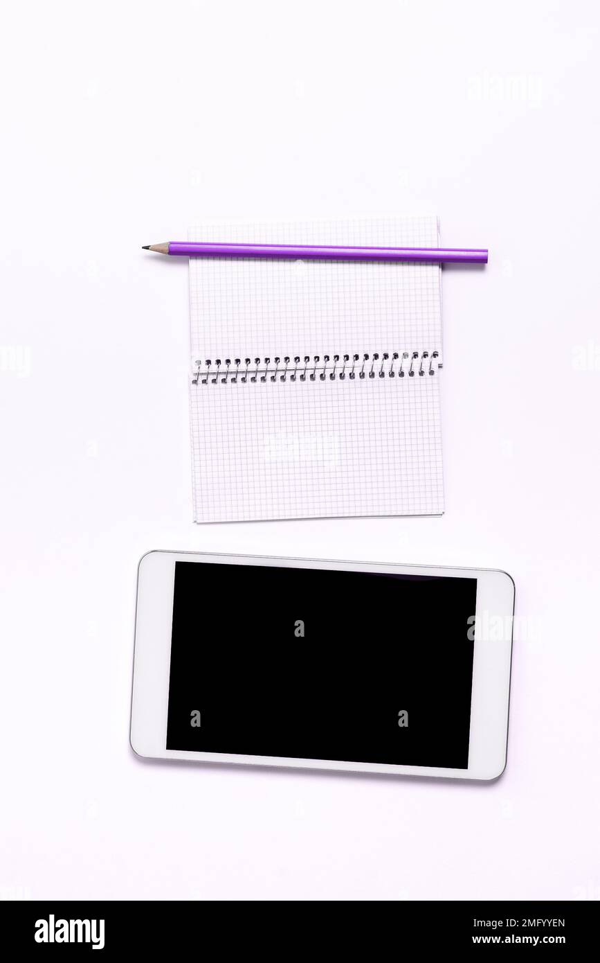 Notebook With Important Messages On Desk With Coffee, Phone And Pen ...