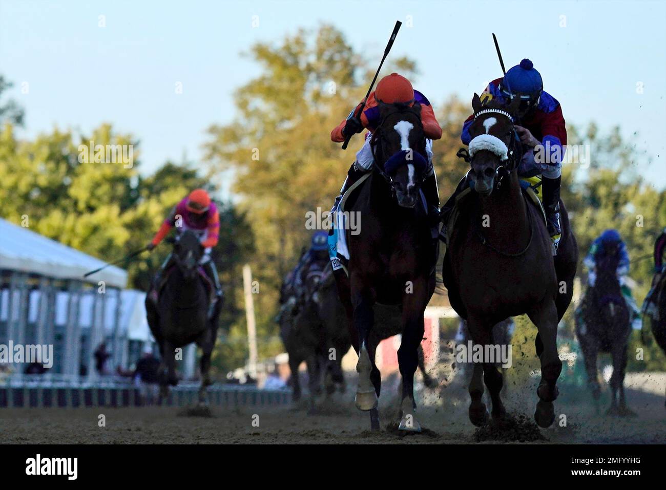 Swiss Skydiver, right, with Robby Albarado aboard, wins the Preakness ...
