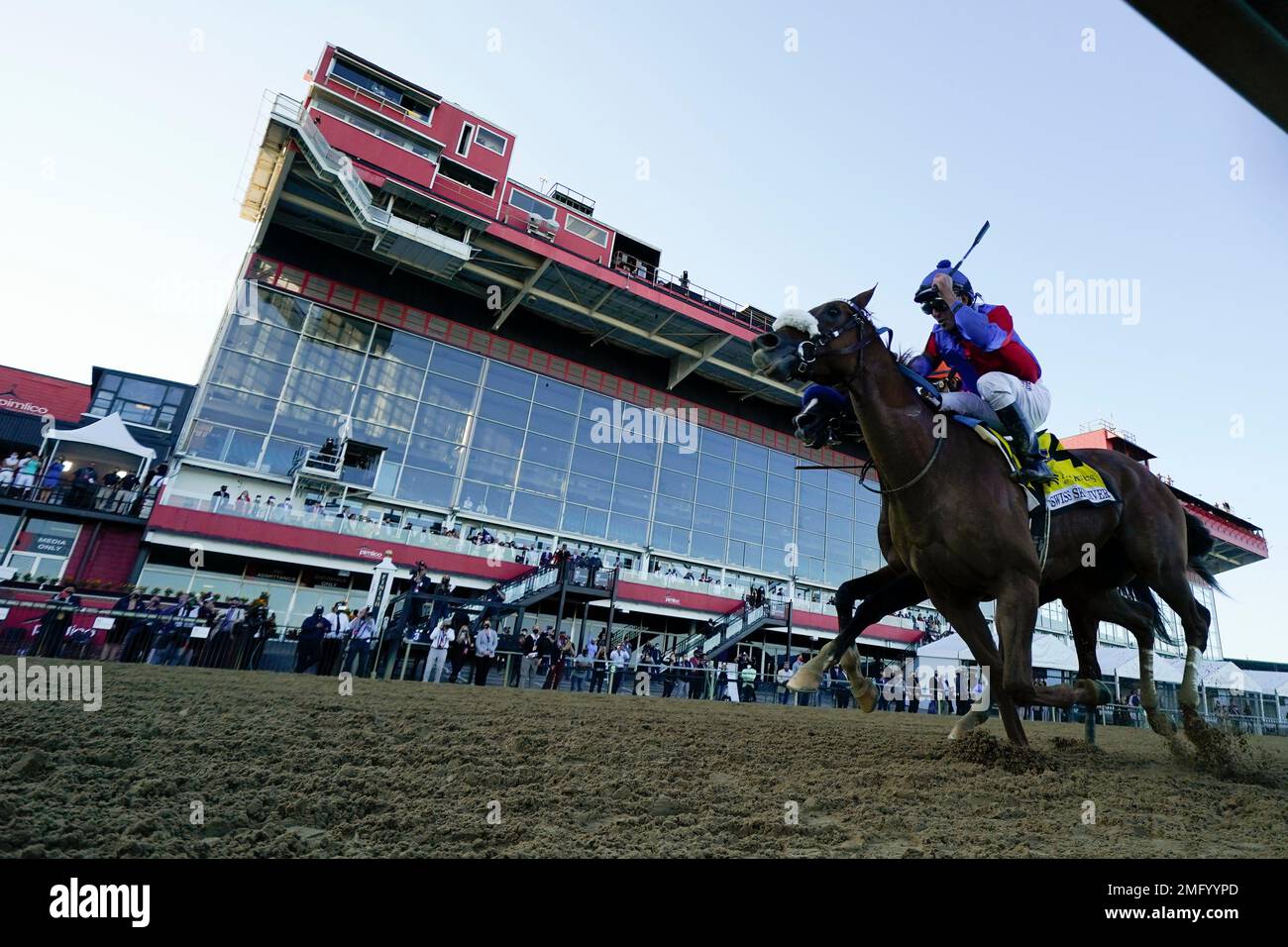 Swiss Skydiver (4) with Robby Albarado aboard runs the rail for a win ...