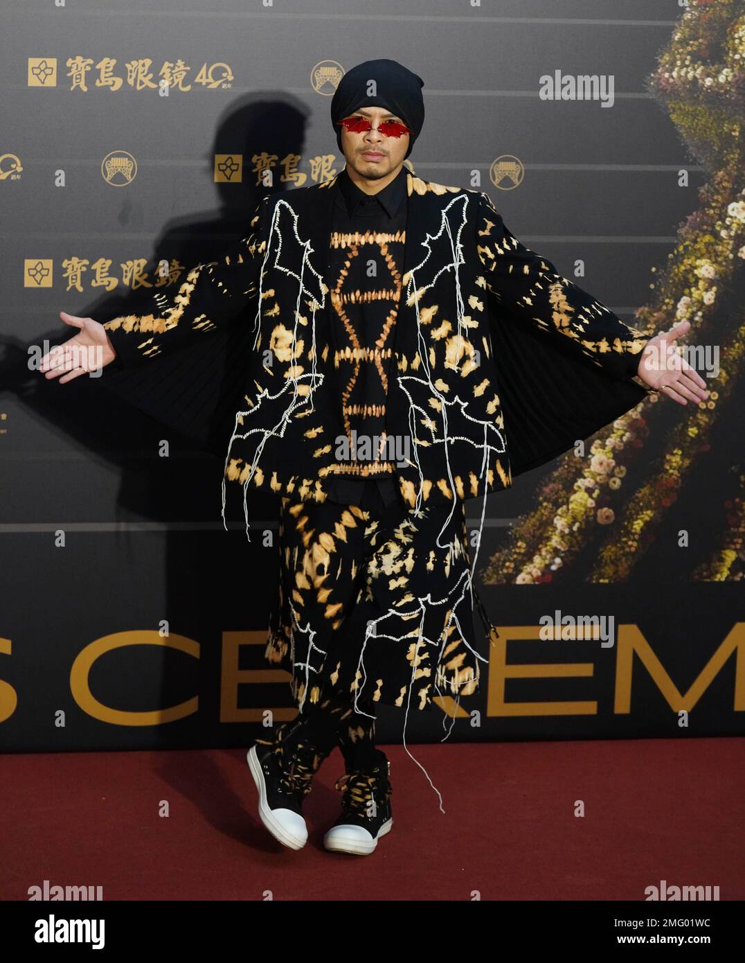 Malaysian singer Namewee poses as he arrives for the 31th Golden Melody ...