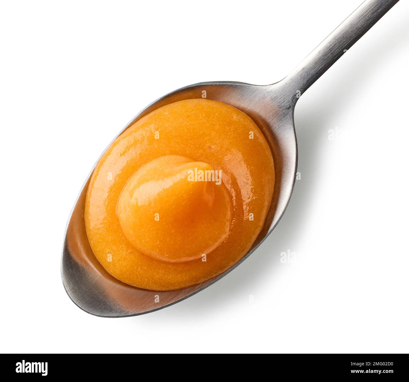 vegetable puree in a spoon isolated on white background, top view Stock ...