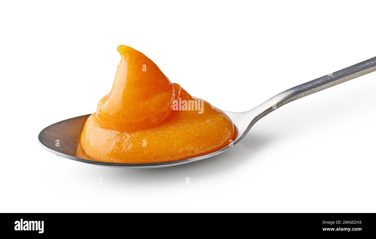vegetable puree in spoon isolated on white background Stock Photo - Alamy