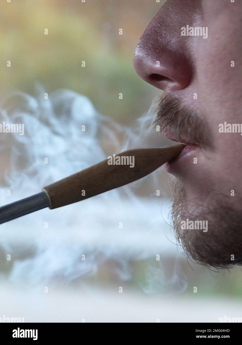 Vintage man smoking a pipe hi-res stock photography and images - Alamy