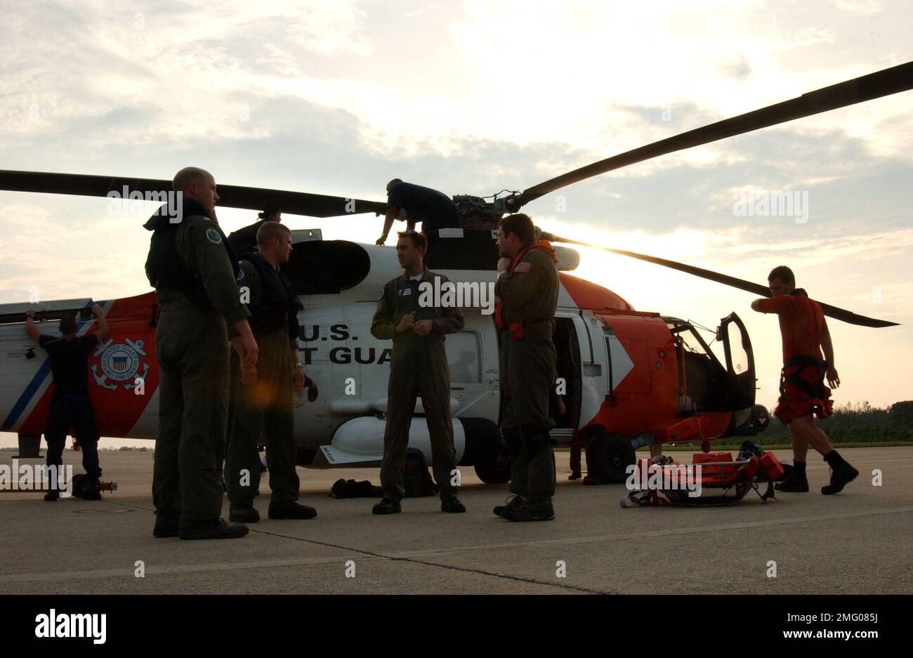 Aircrafts - HH-60 Jayhawk - 26-HK-53-75. Personnel on ramp with HH-60 ...