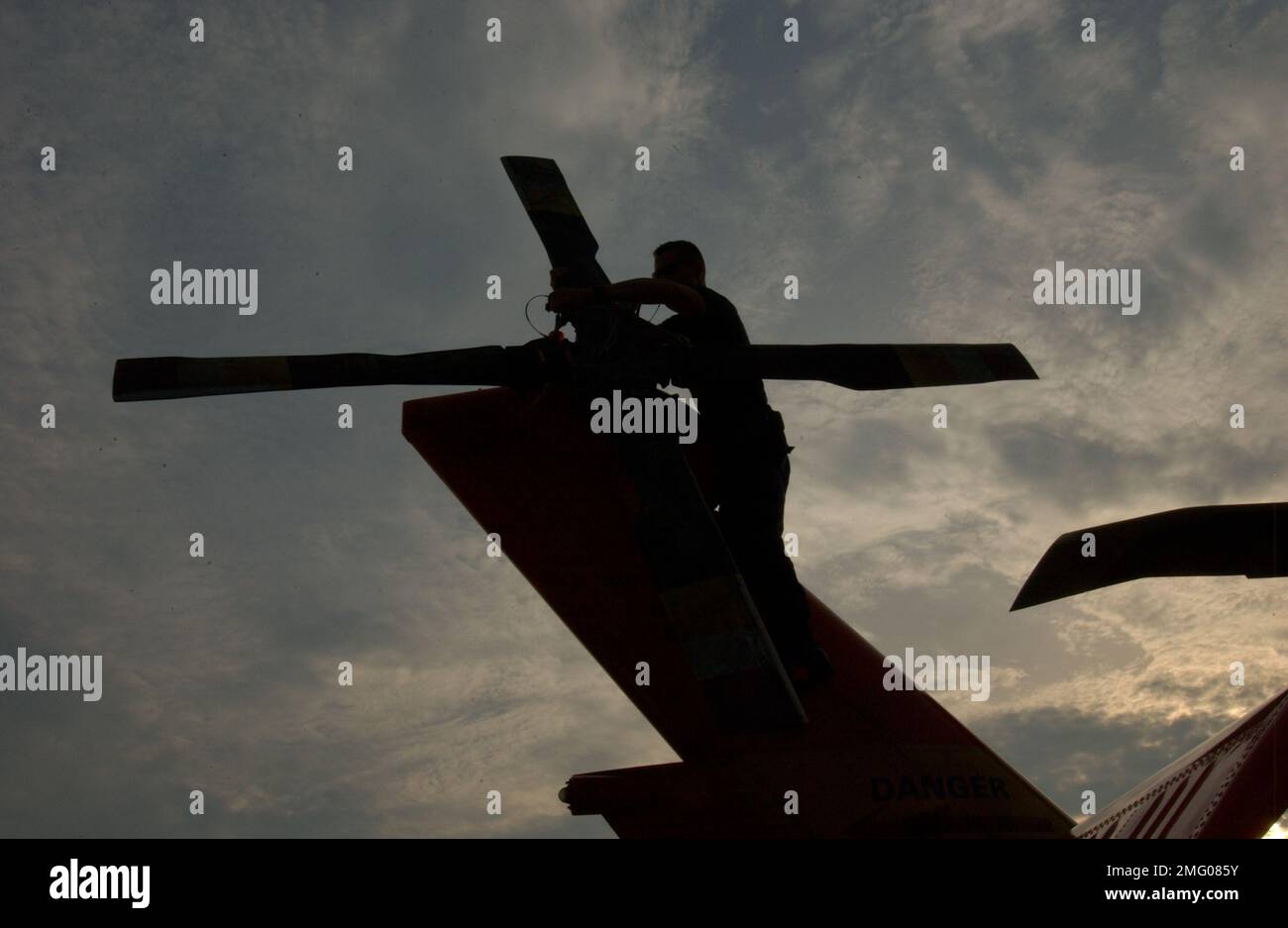 Coast Guard Personnel - Miscellaneous - 26-HK-90-348. shadowed view of ...