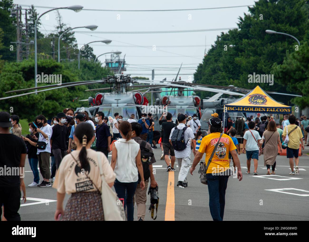 NAVAL AIR FACILITY ATSUGI, Japan (August 20, 2022) Visitors walk ...