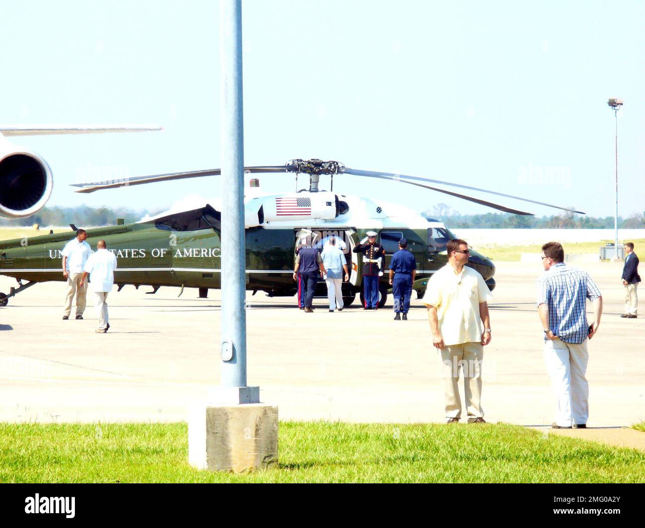 . President Bush salute onto Marine 1 on ATC ramp. Hurricane Katrina ...