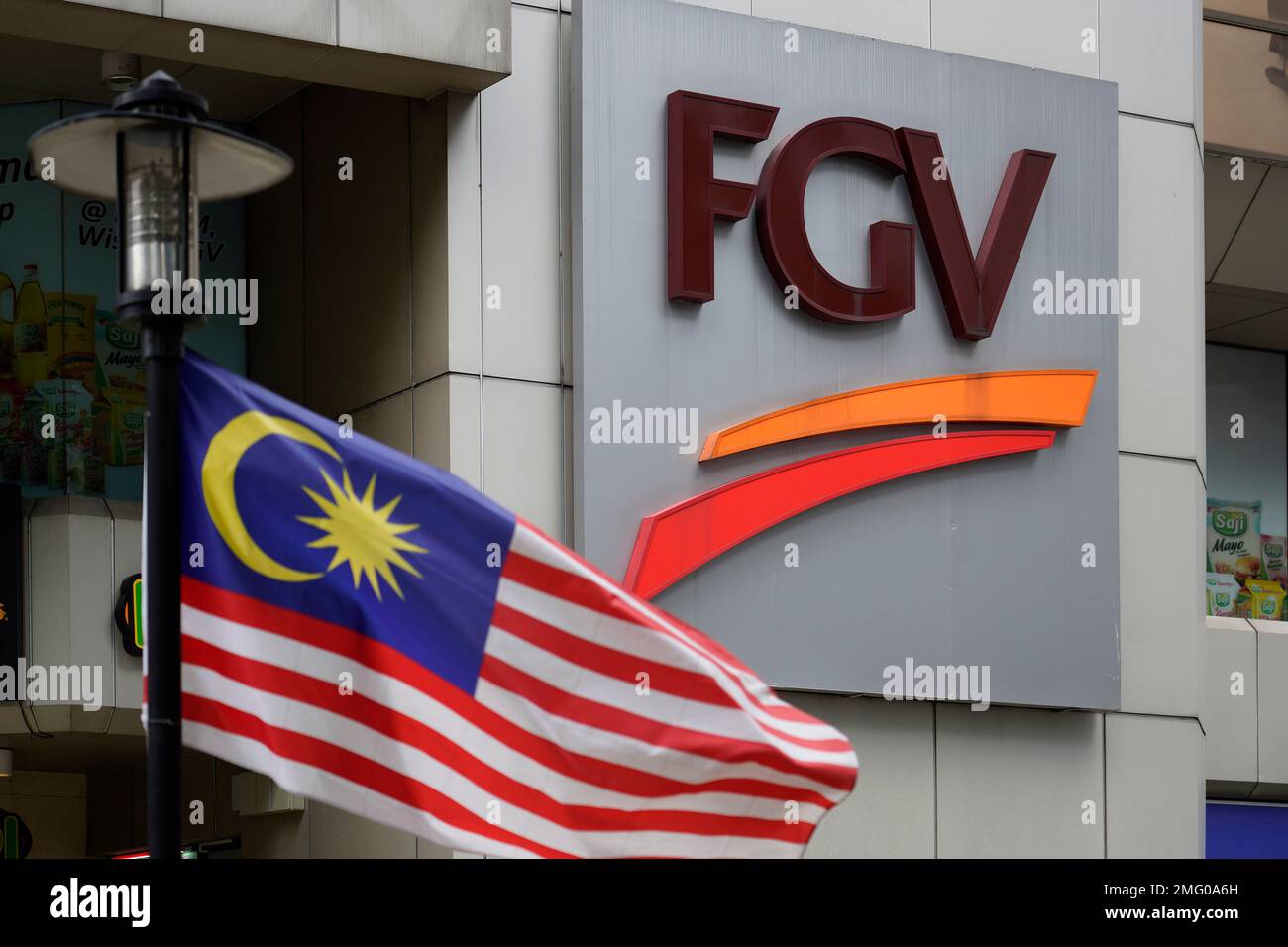 A Malaysian national flag is on display outside FGV Holdings Berhad ...