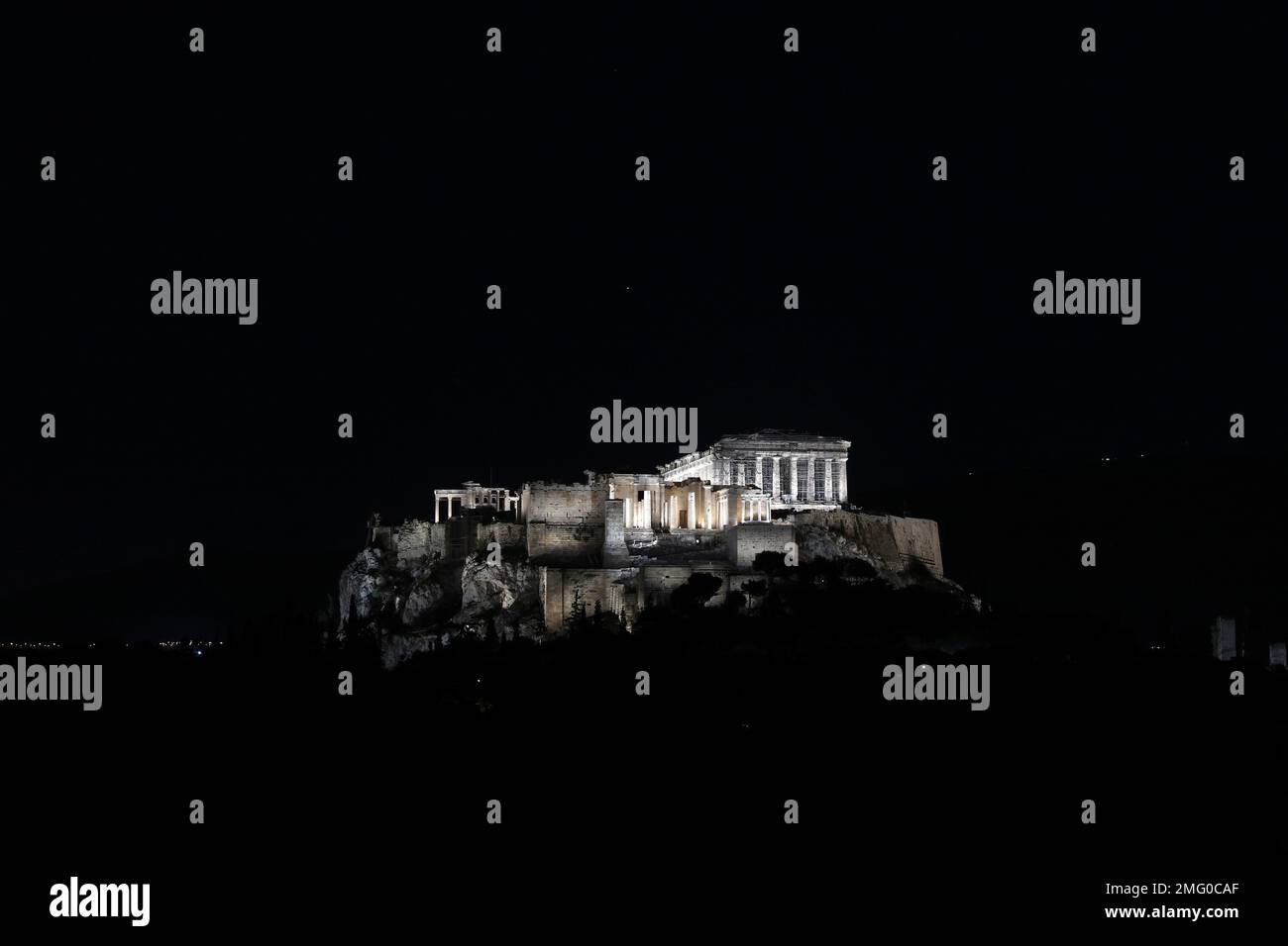 A new lighting system illuminates the Parthenon temple atop of the ...