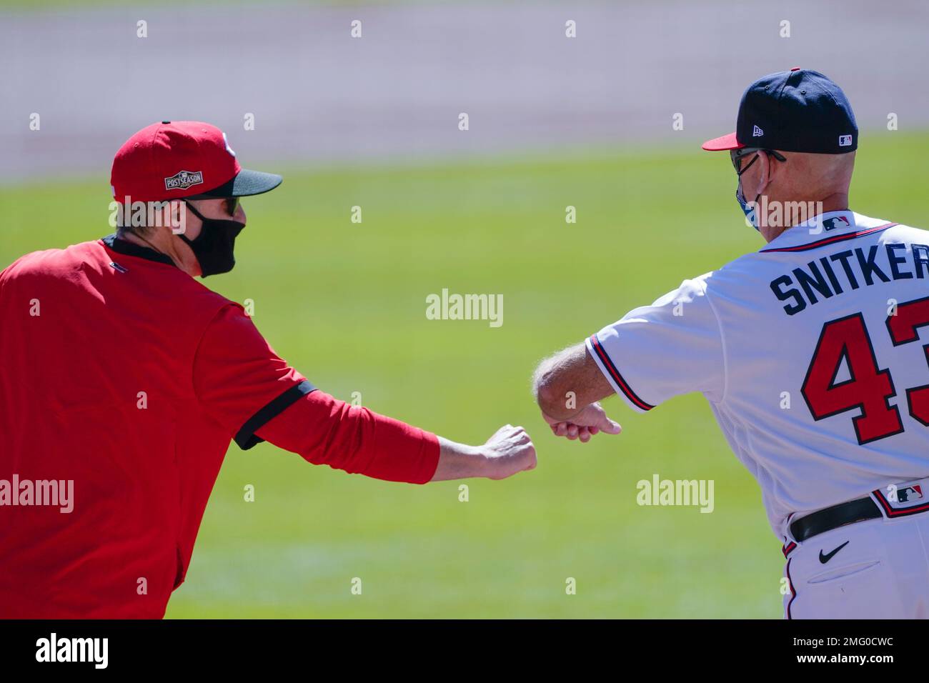 Atlanta Braves and Cincinnati Reds managers, Brian Snitker, right, and ...
