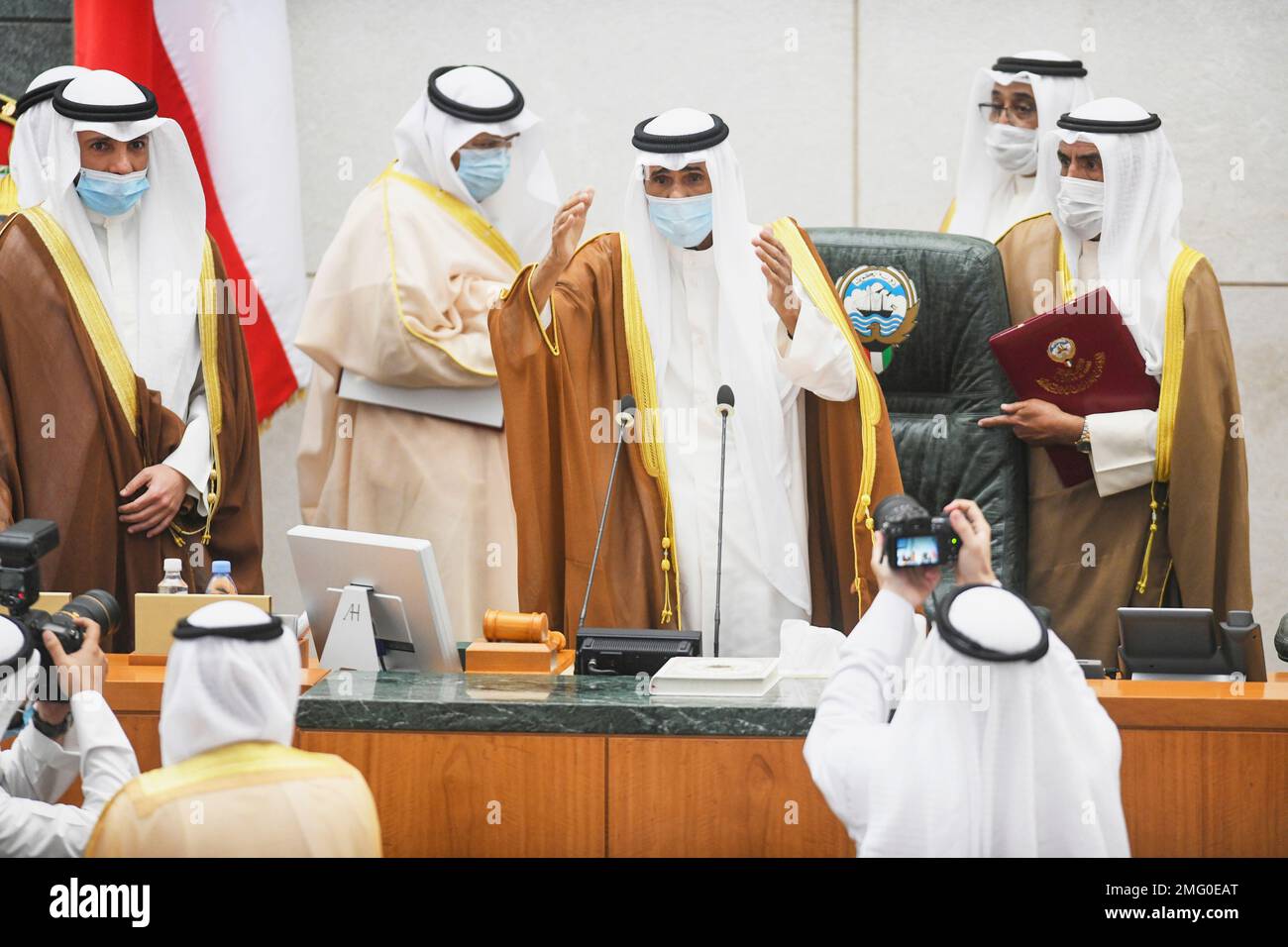 The new Emir of Kuwait Sheikh Nawaf Al Ahmad Al Sabah, center, performs ...
