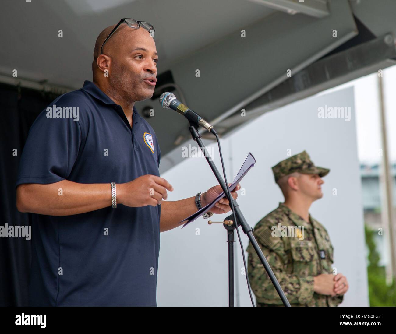 Capt. David Adams, Commander, Fleet Activities Sasebo (CFAS) speaks to ...
