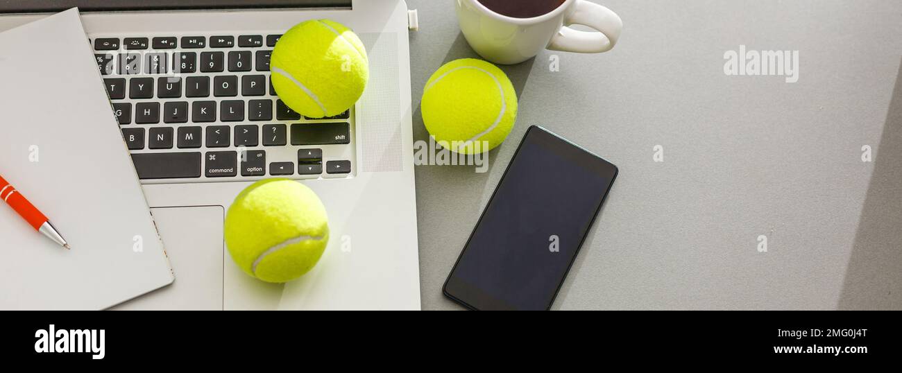 Sports tennis player with racket in blue costume. Woman atlete. Laptop ...