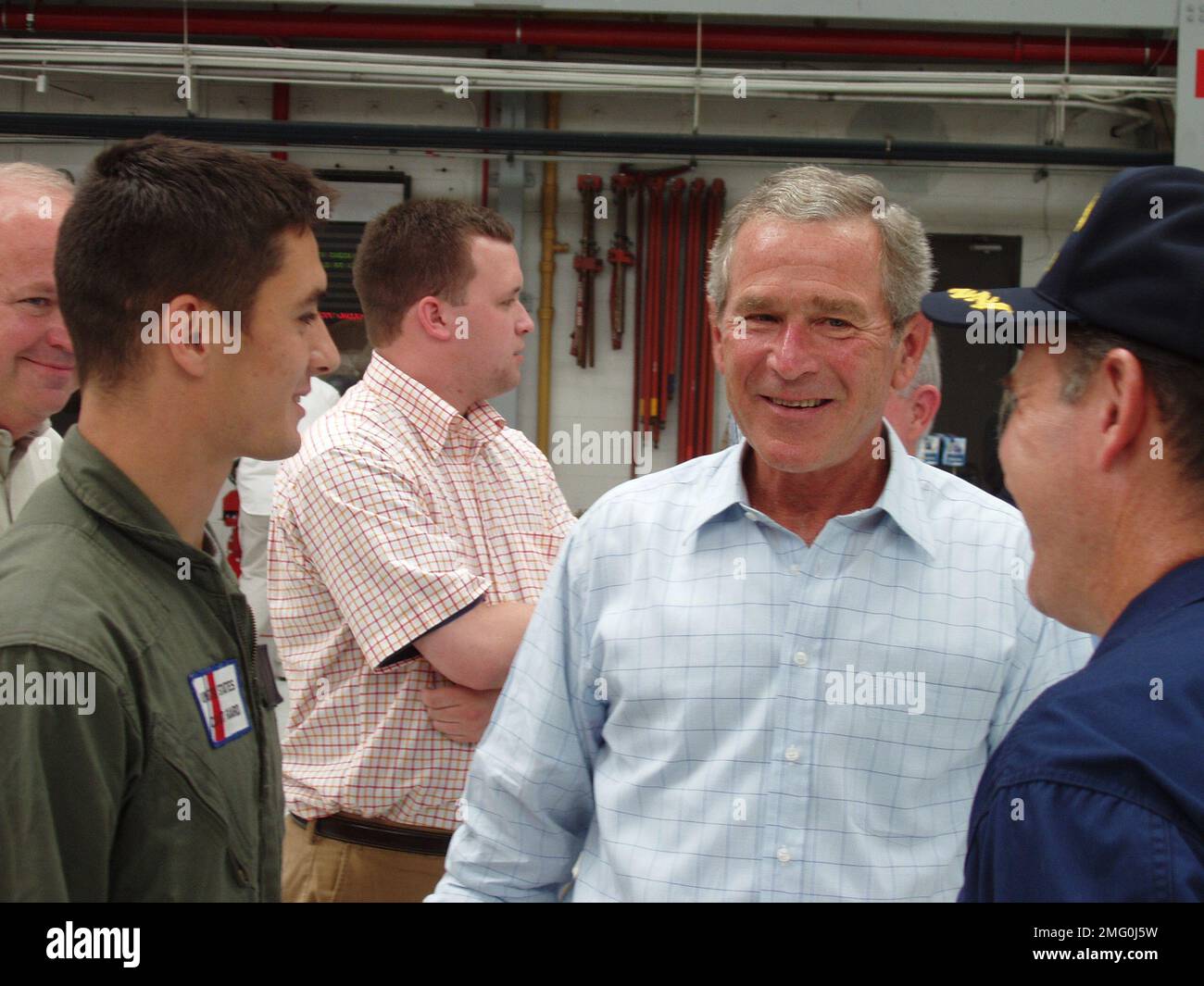 President George W. Bush Visit - 26-HK-6-279. POTUS with CG personnel ...