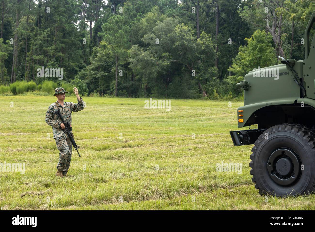 U.S. Marine Corps Lance Cpl. Seth Travis, a motor vehicle operator with ...