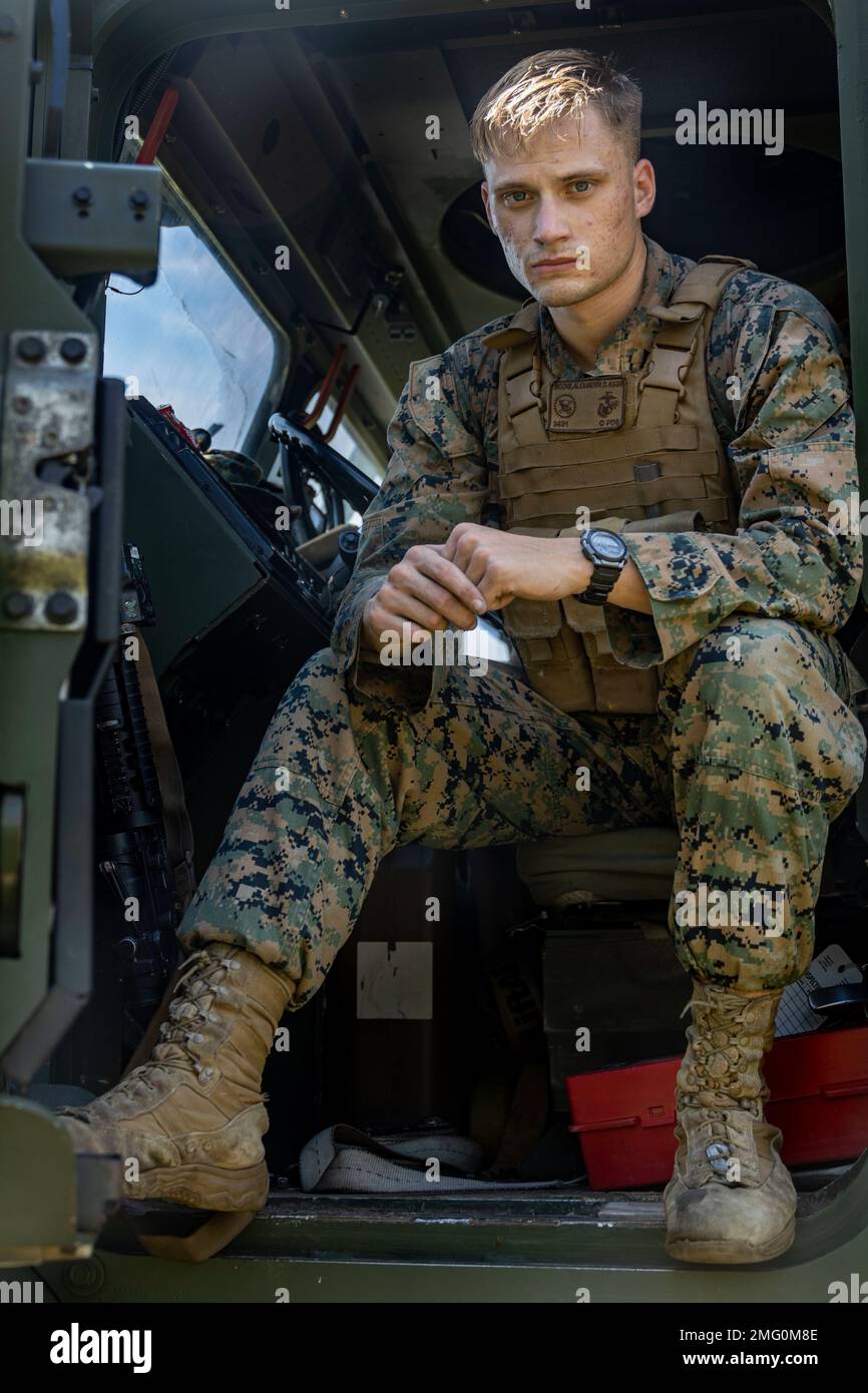 U.S. Marine Corps Lance Cpl. Alexander Moore, a motor vehicle operator ...