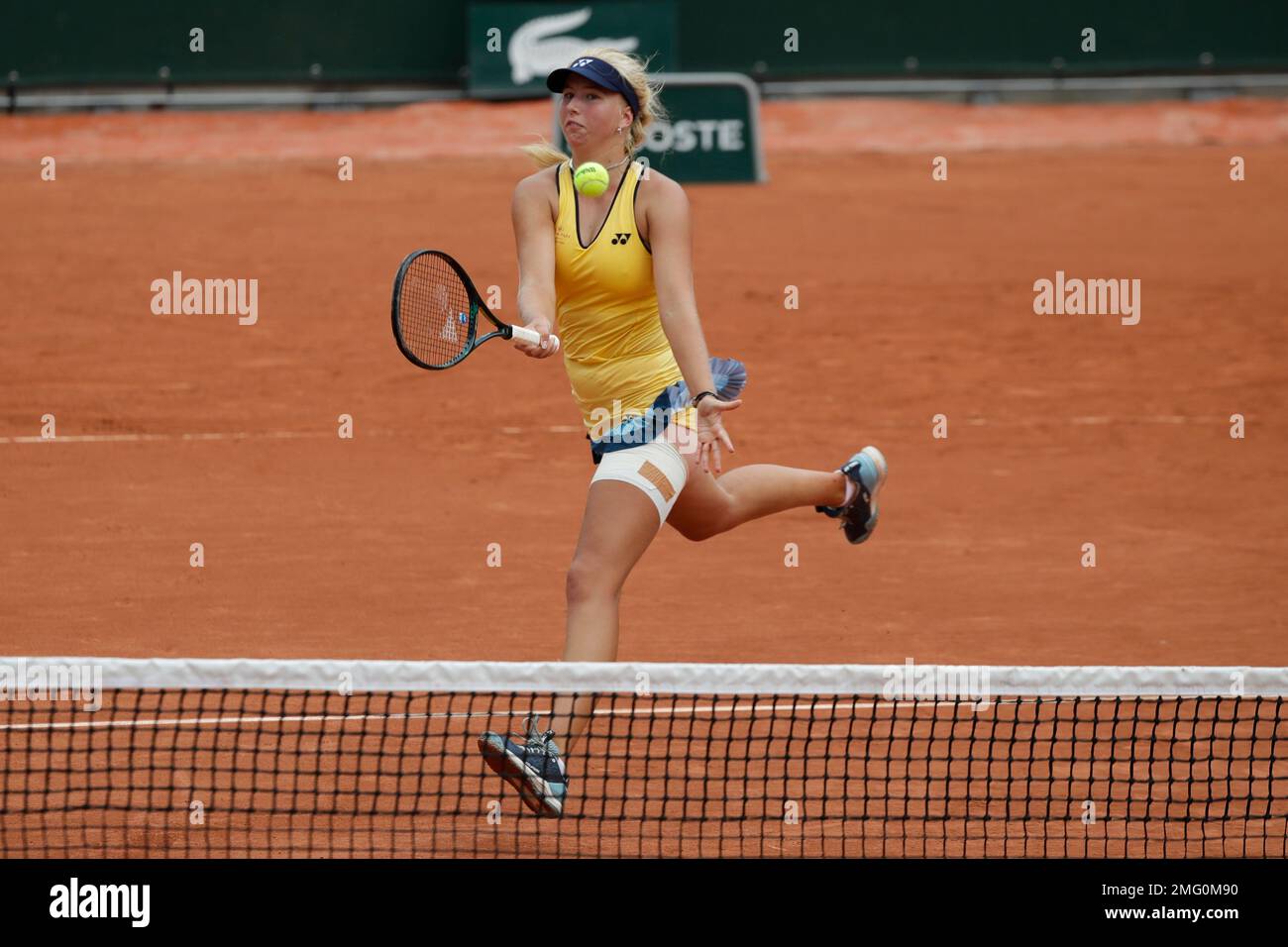 Denmark's Clara Tauson plays a shot against Jennifer Brady of the U.S ...