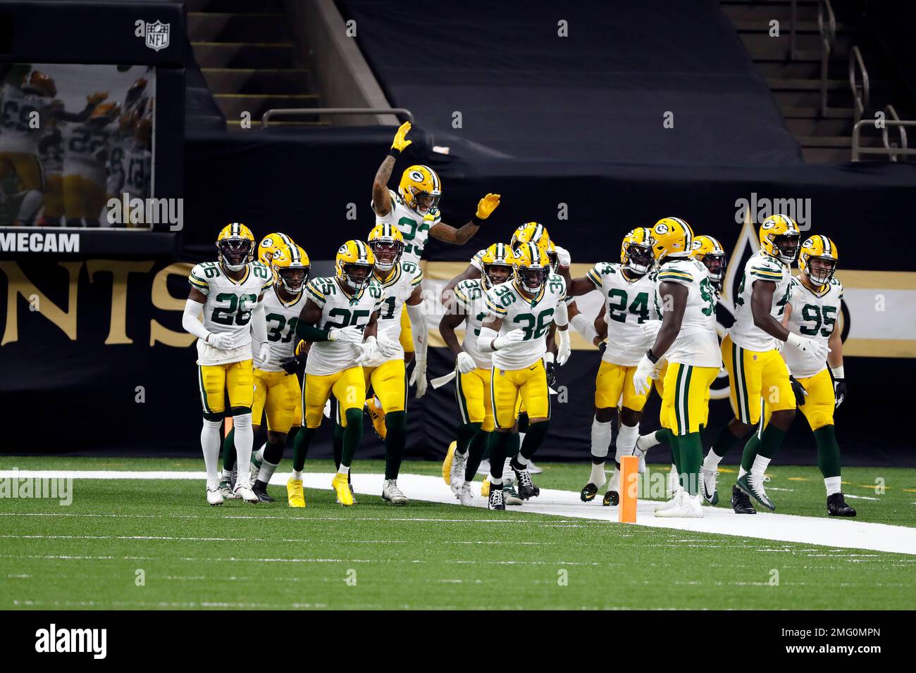 The Green Bay Packers celebrate in front of the Endzone Cam after ...