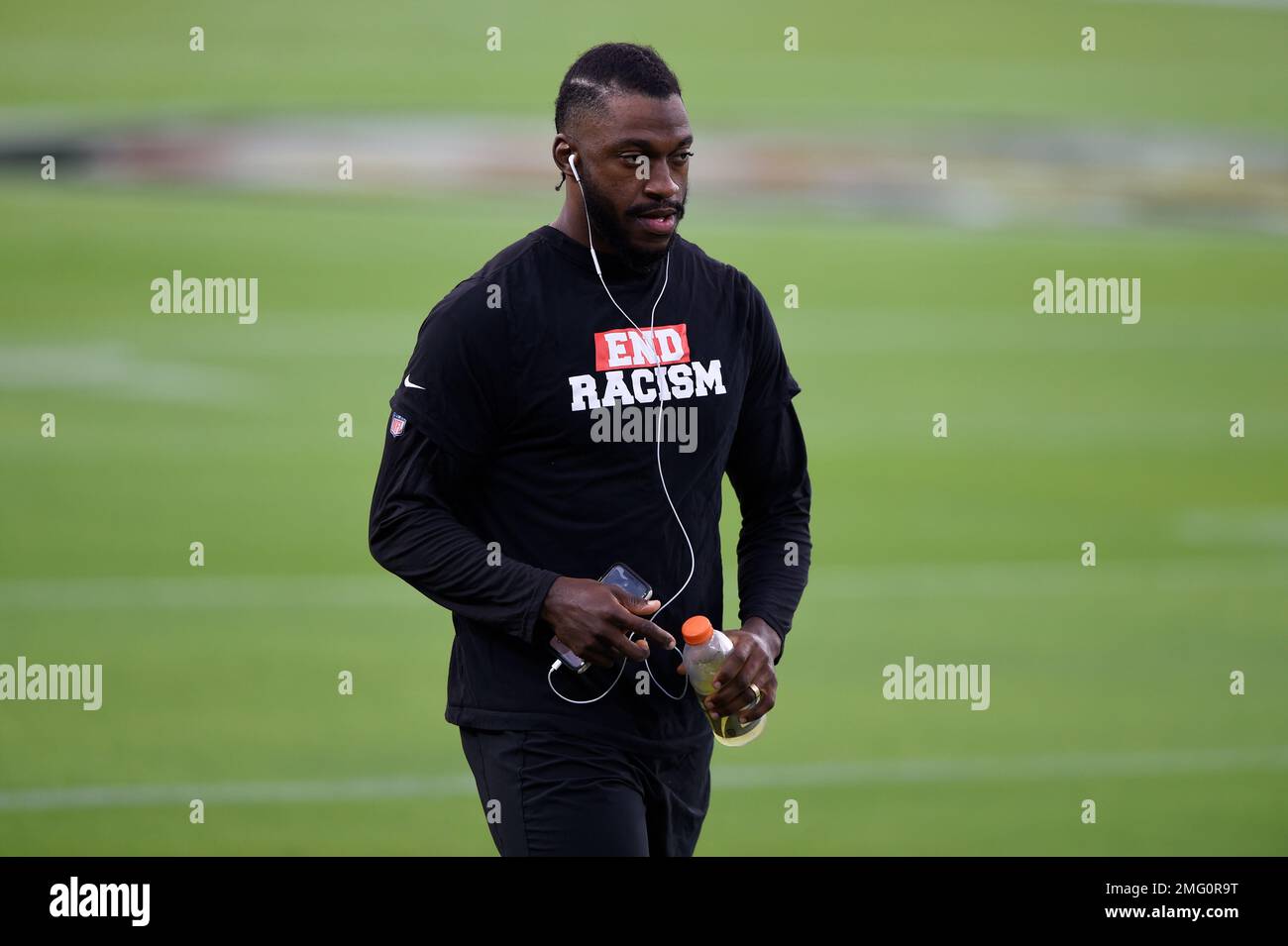 Baltimore Ravens quarterback Robert Griffin III warms up before an NFL ...