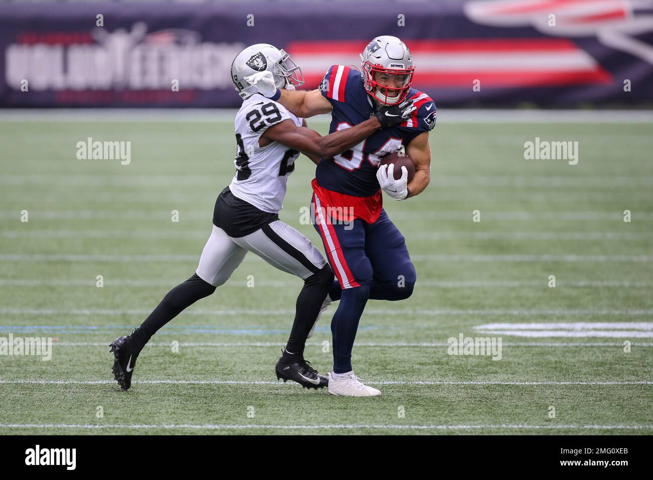 New England Patriots running back Rex Burkhead (34) stiff-arms Las ...