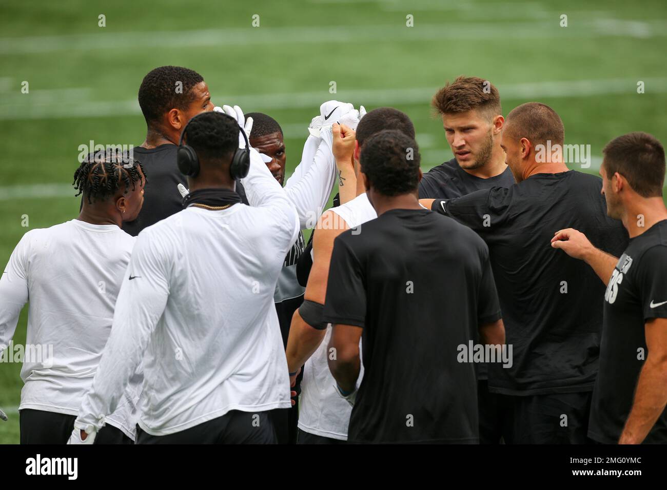 Las Vegas Raiders huddle up prior to an NFL football game against the ...