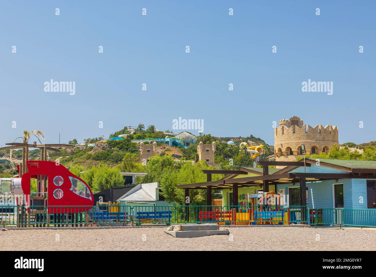 Beautiful landscape view of modern playground on front and ancient ...