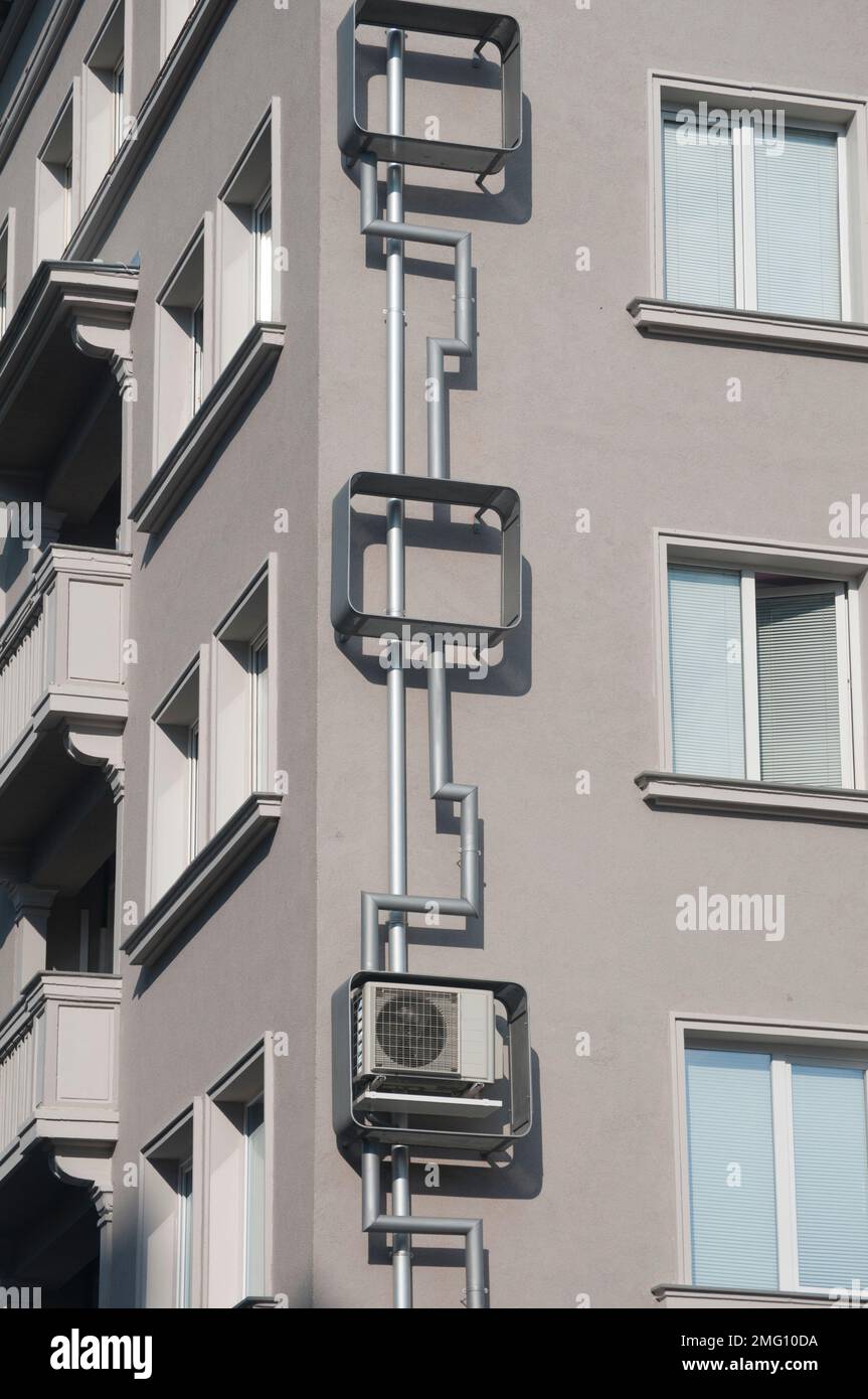 Facade of city building with external air conditioning units Stock ...