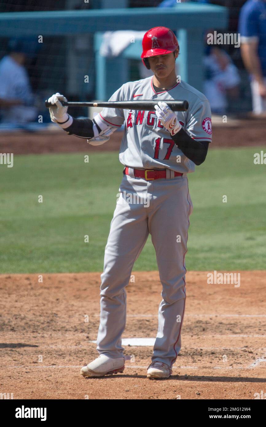 Los Angeles Angels' Shohei Ohtani looks at his bat during a baseball ...