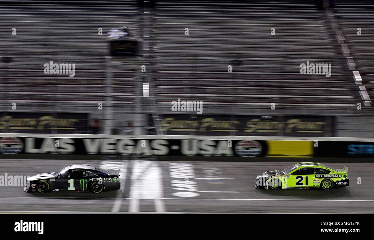 Kurt Busch (1) takes the checkered flag to win a NASCAR Cup Series auto ...