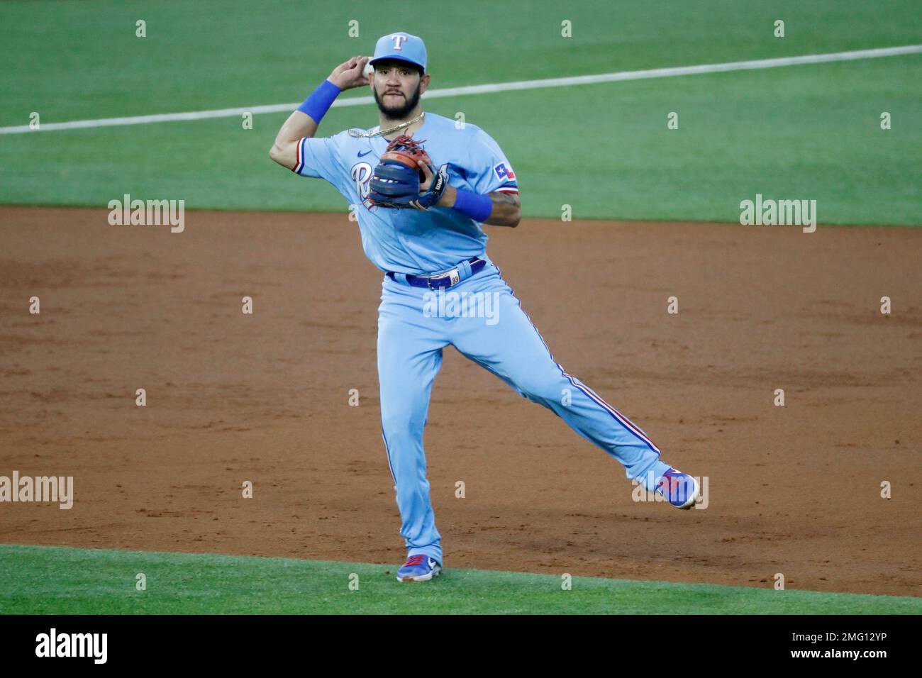 Texas Rangers shortstop Anderson Tejeda throws to first during a ...