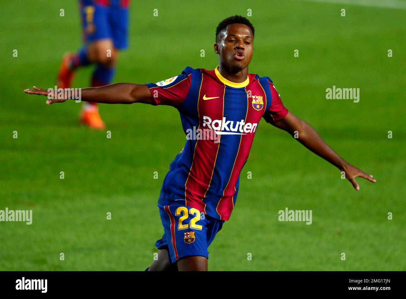 Barcelona's Ansu Fati celebrates scoring the opening goal during the ...