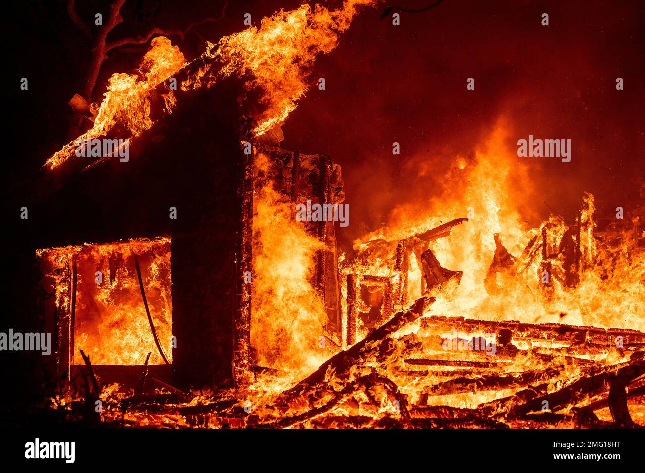 Flames from the Glass Fire consume a vineyard building in St. Helena ...