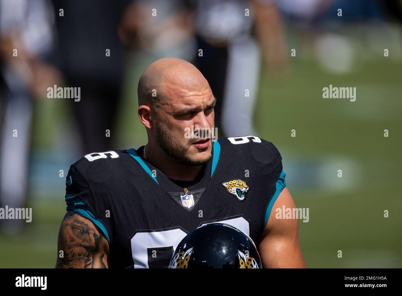 Jacksonville Jaguars defensive end Adam Gotsis (96) stretches before an ...