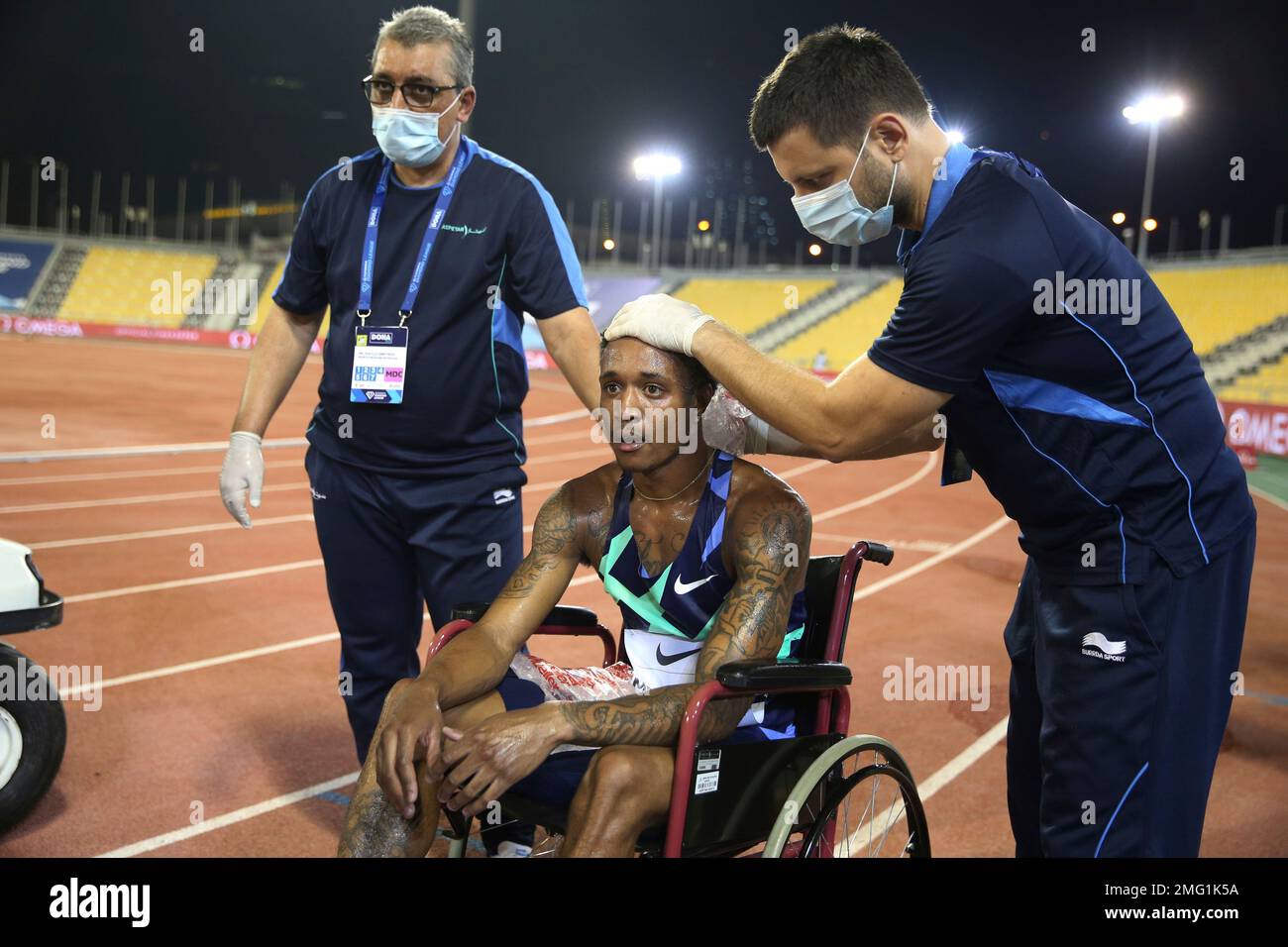 Kahmari Montgomery of the U.S., leaves the stadium on a wheelchair ...