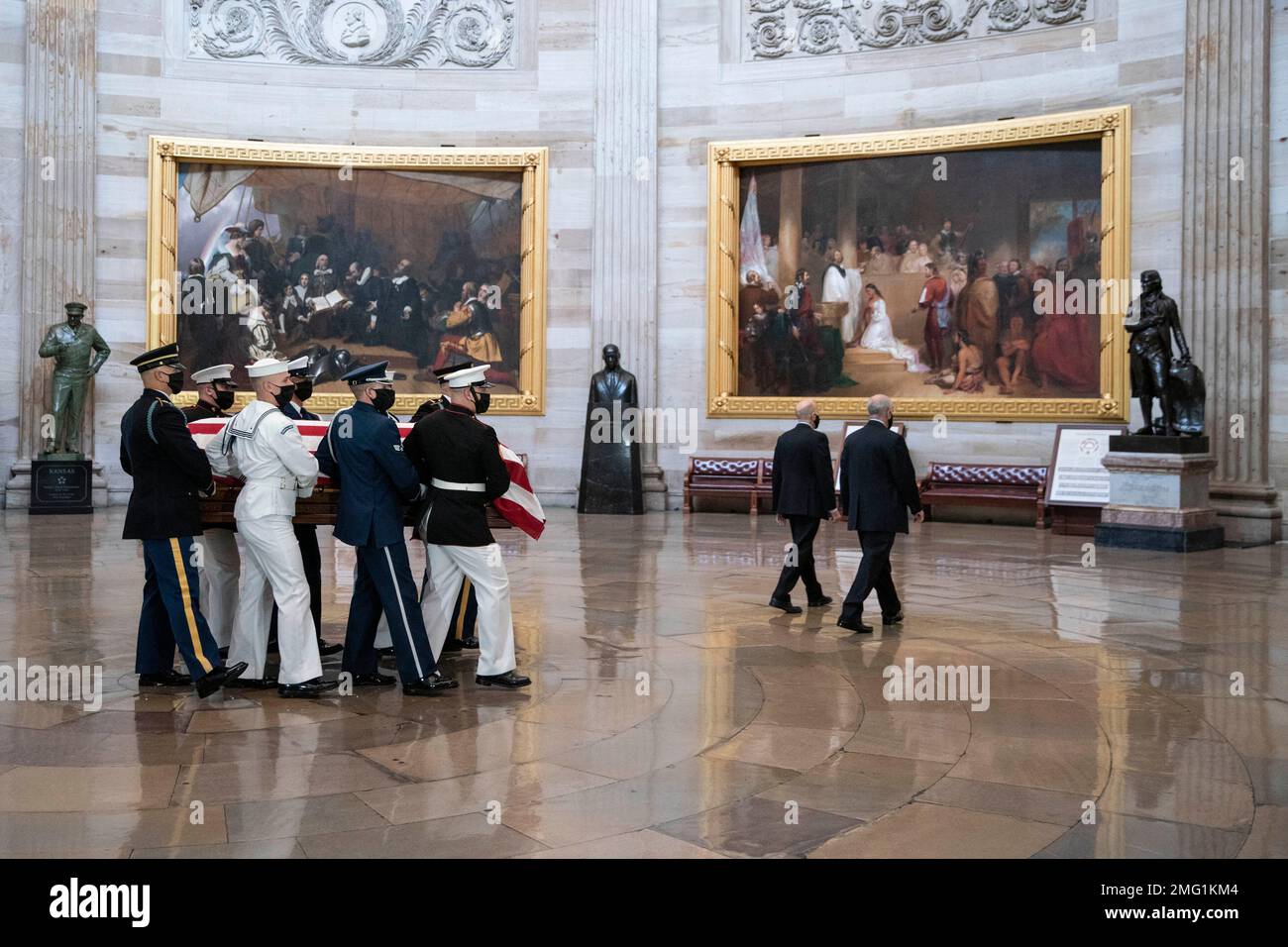 The flag-draped casket of Justice Ruth Bader Ginsburg is carried ...