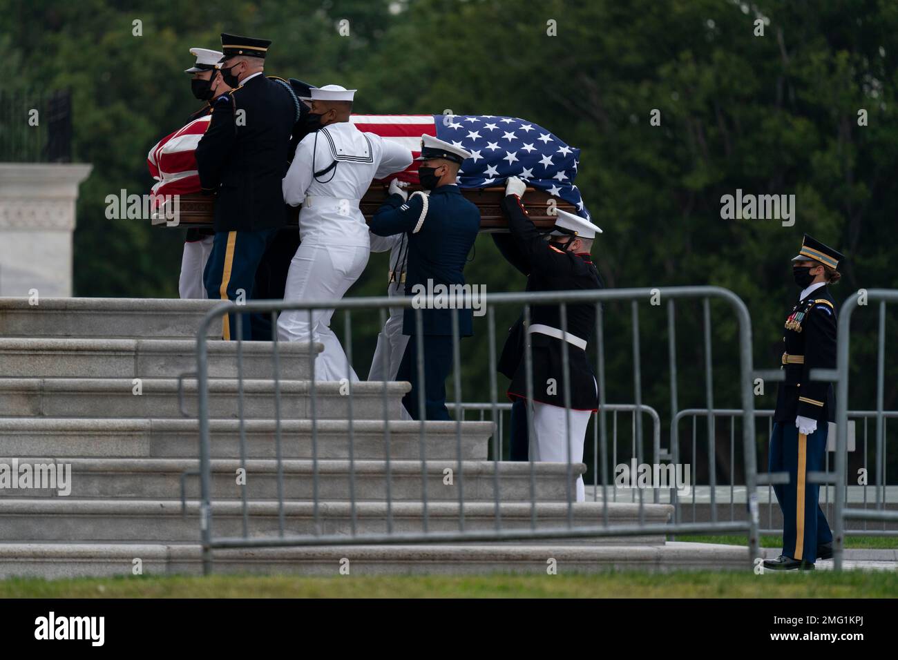 The flag-draped casket of Justice Ruth Bader Ginsburg is carried by ...