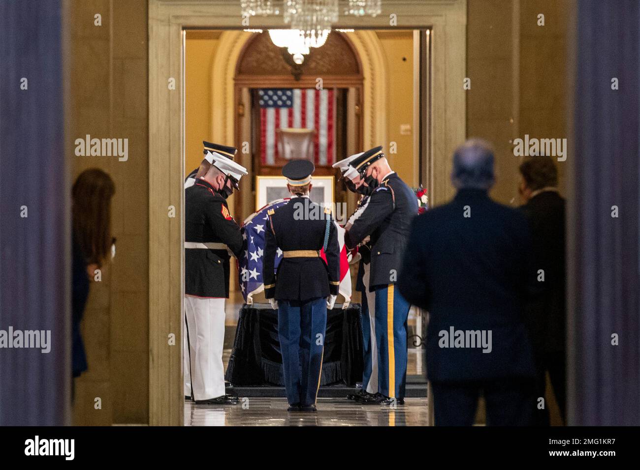 The flag-draped casket of Justice Ruth Bader Ginsburg is placed on a ...