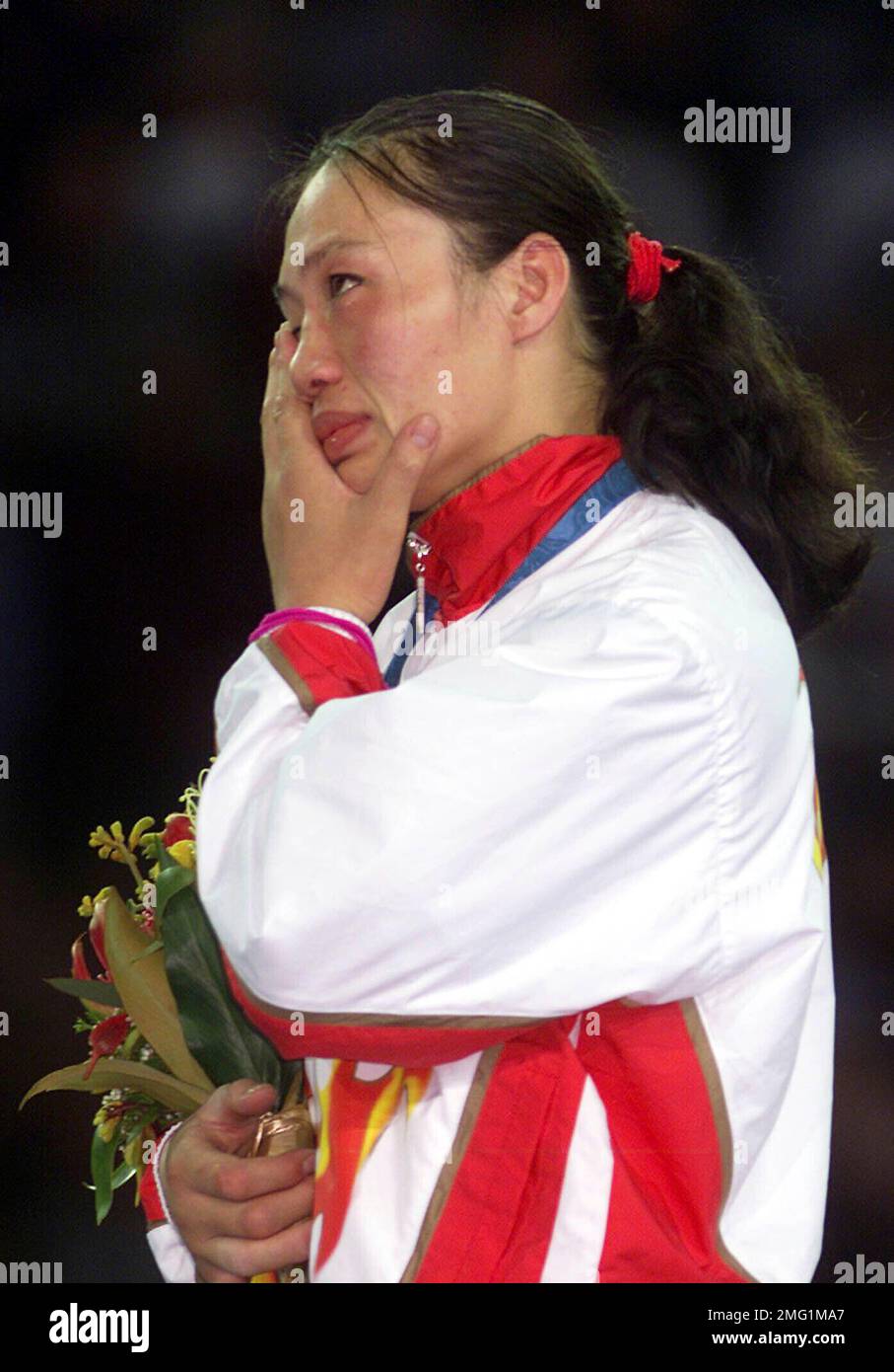 China's Tang Lin cries on the podium of the women's Judo -78kg event at ...