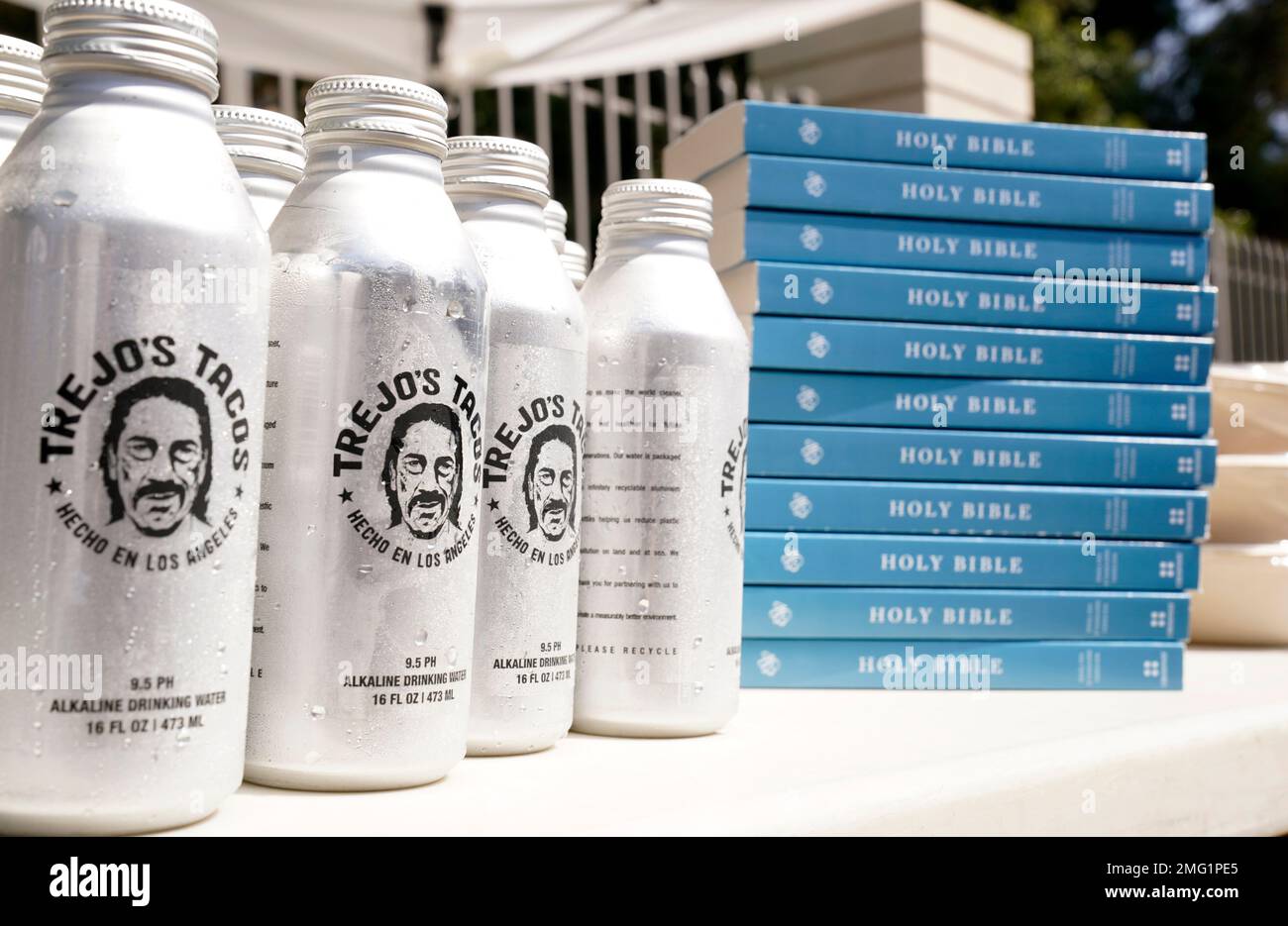 Trejo's Tacos water bottles and bibles are pictured before actor Danny Trejo handed out food ...