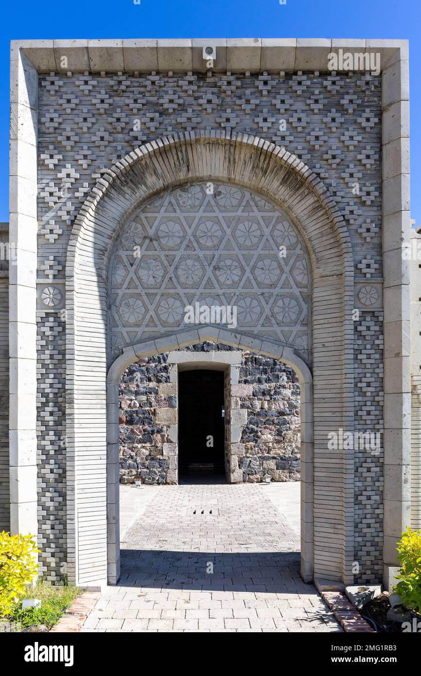 White stone carved archway gate with arabic and ottoman floral ...