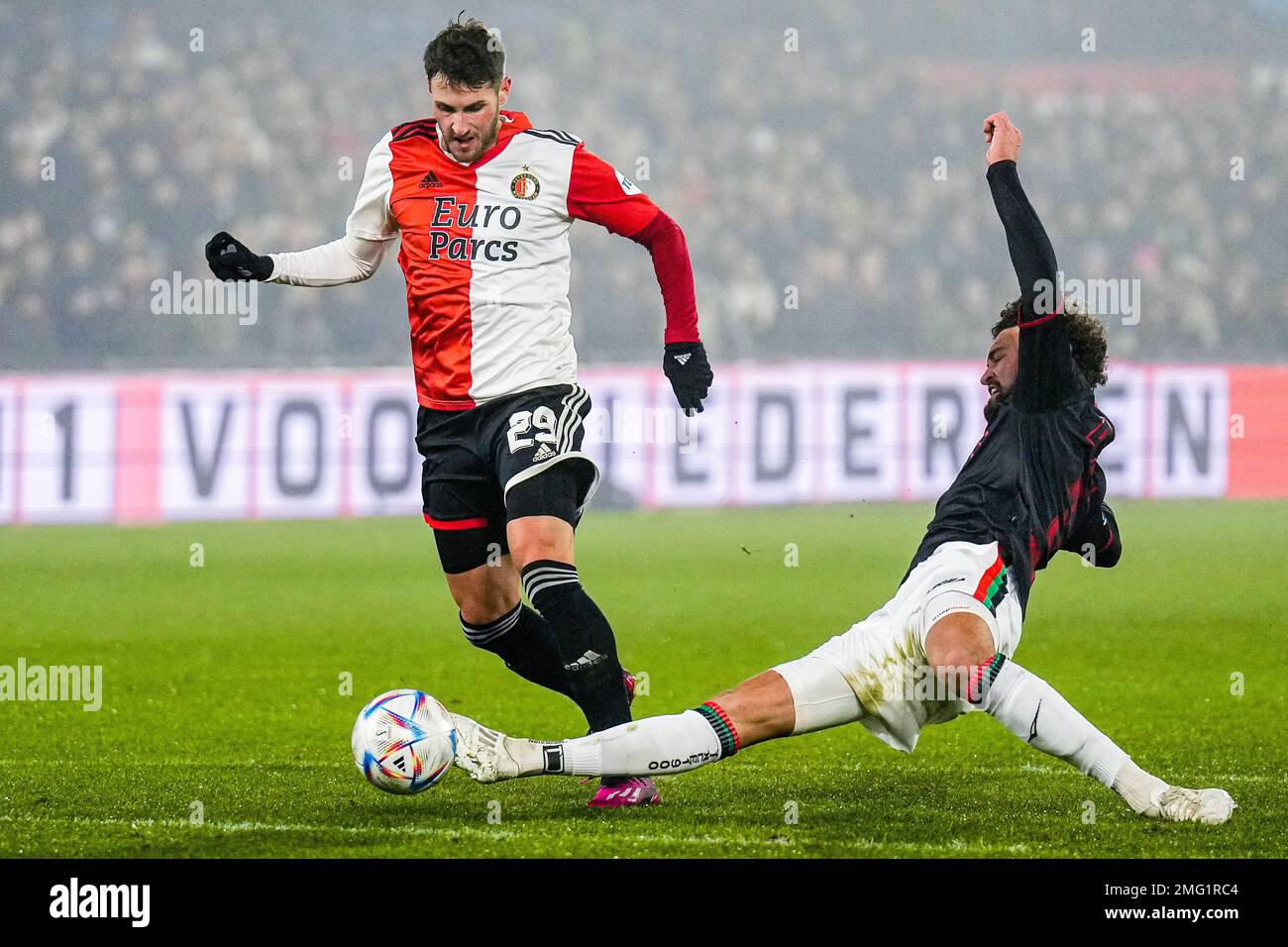Rotterdam - Santiago Gimenez of Feyenoord, Philippe Sandler of NEC Nijmegen during the match ...
