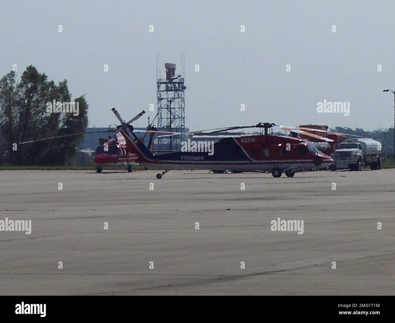 Aircrafts - Miscellaneous - 26-HK-56-54. Firehawk helicopter on ramp ...