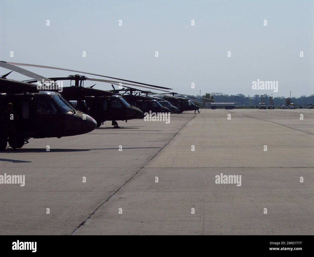 Aircrafts - Blackhawk - 26-HK-50-18. line of Blackhawks on flight line ...