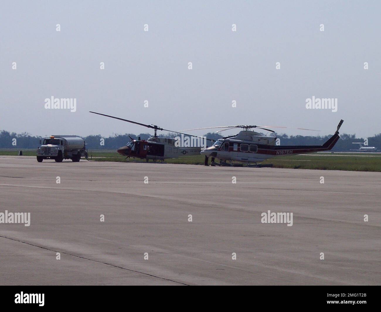 Aircrafts - Miscellaneous - 26-HK-56-65. Helicopters on ramp with fuel ...