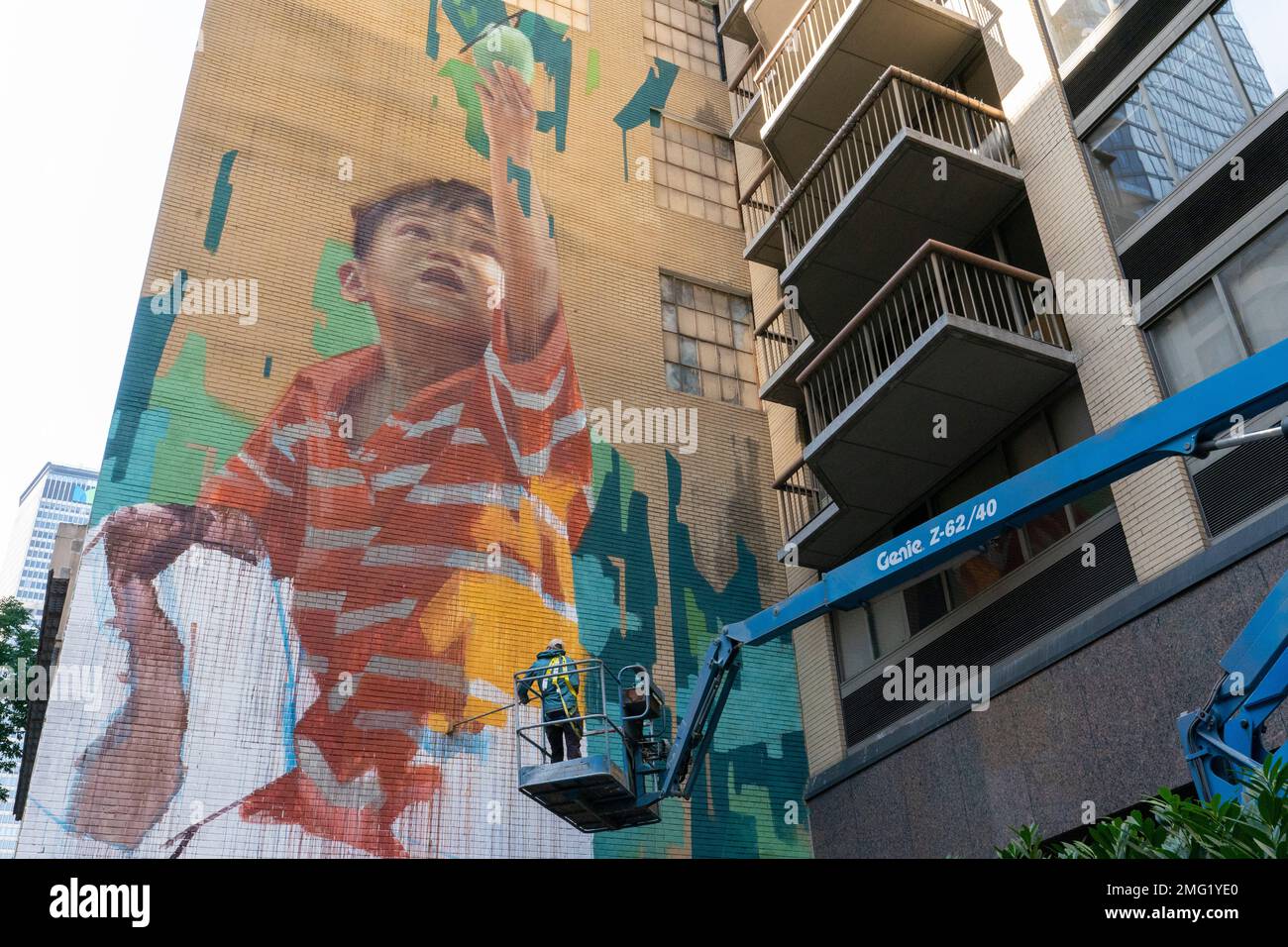 Street Artist Emmanuel Jarus works on a mural, Wednesday, Sept. 23 ...