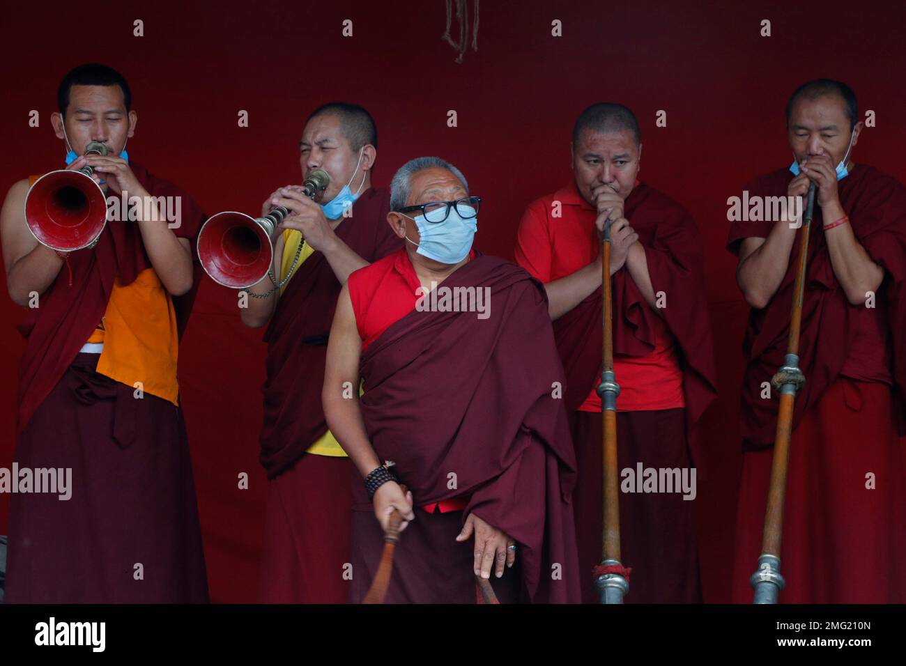 Buddhist monks play traditional instruments during the funeral of ...